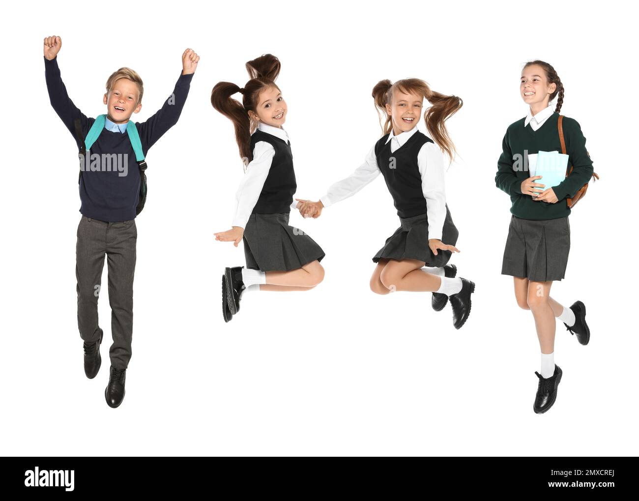 Children in school uniforms on white background Stock Photo - Alamy
