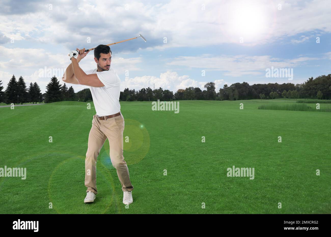 Man playing golf on course hi-res stock photography and images - Alamy