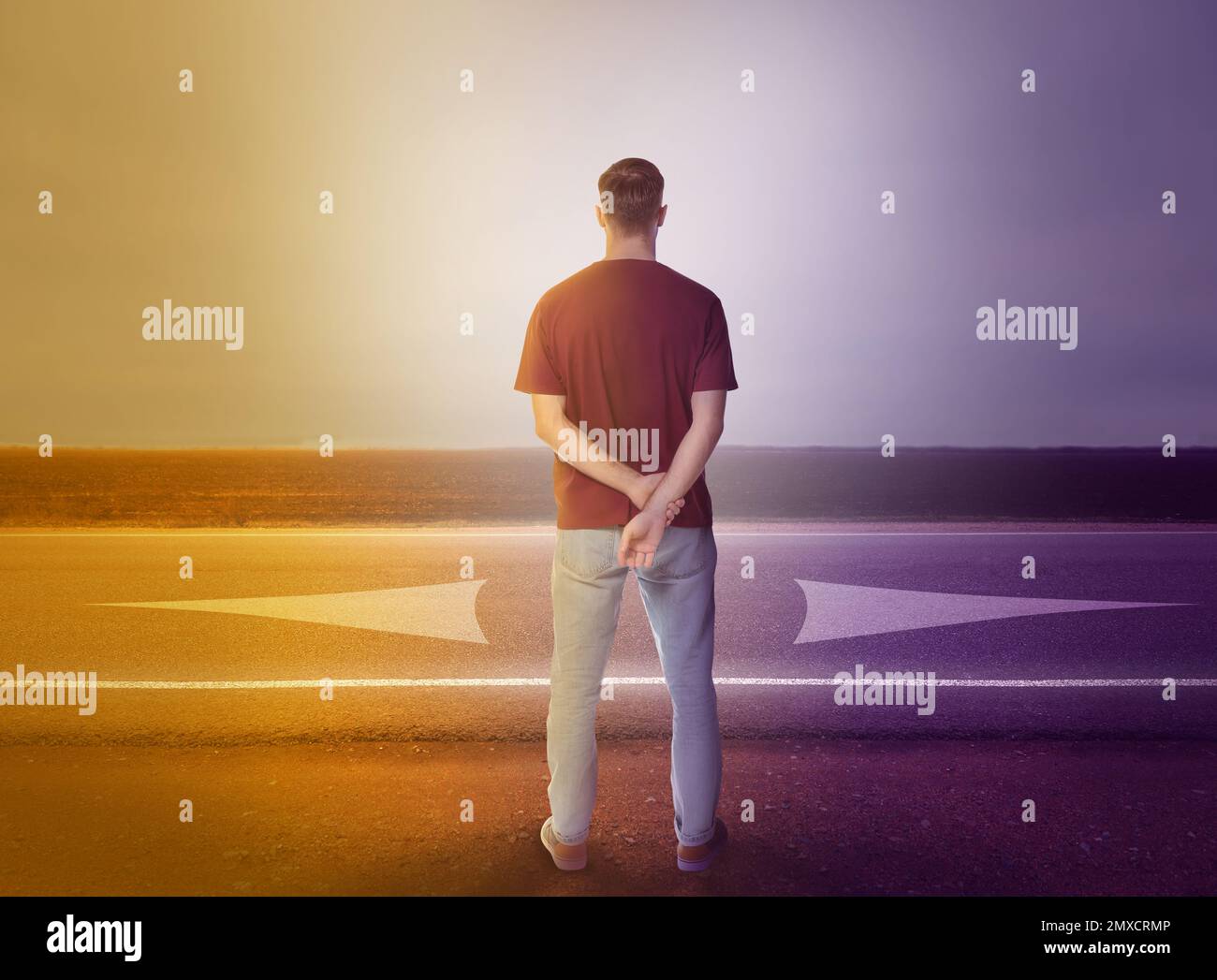 Man standing at crossroads. Concept of choice between different ways ...