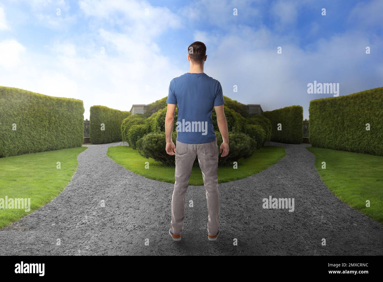 Man standing at crossroads. Concept of choice between different ways ...