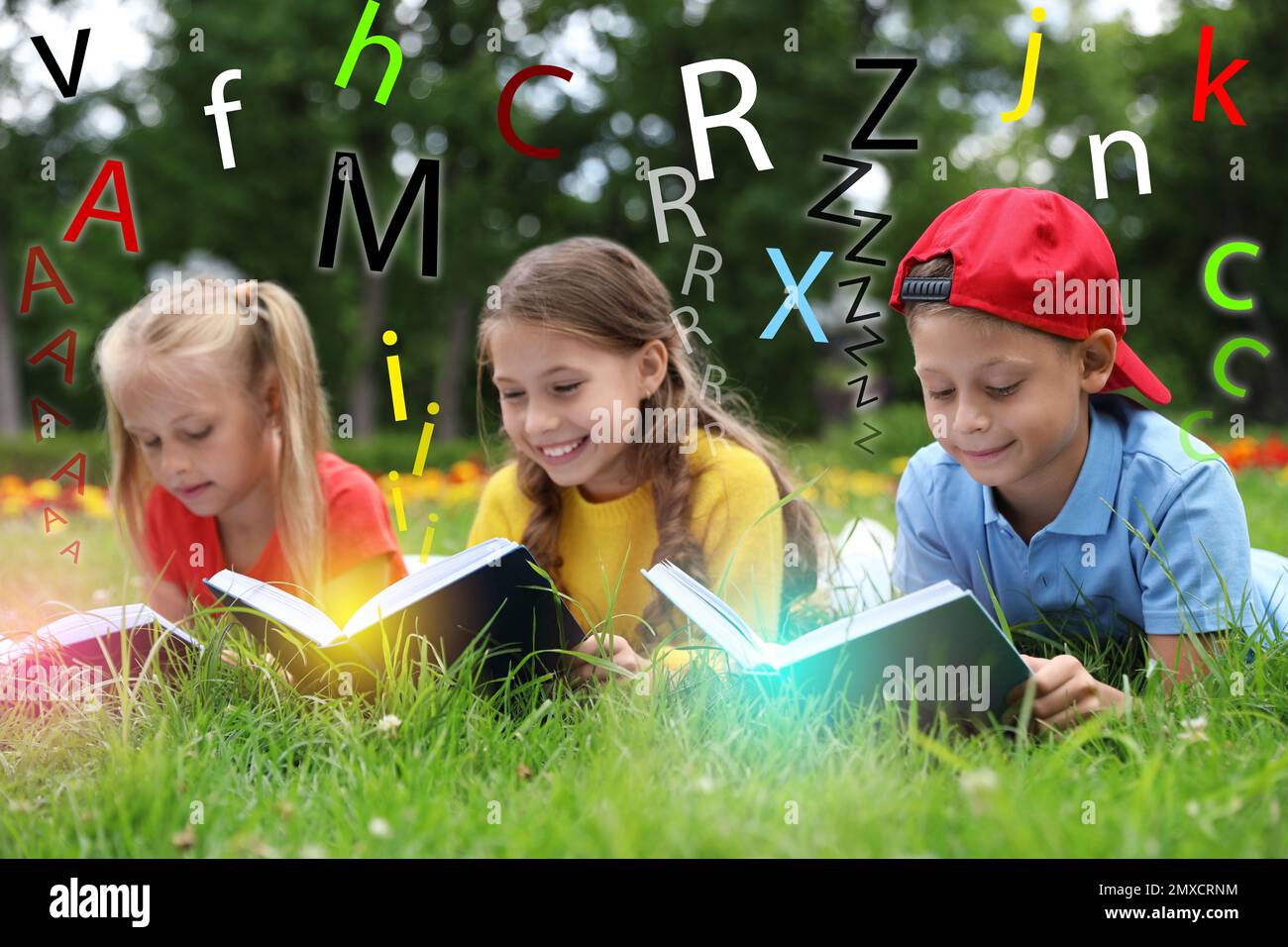 Group of kids reading outdoors hi-res stock photography and images - Alamy