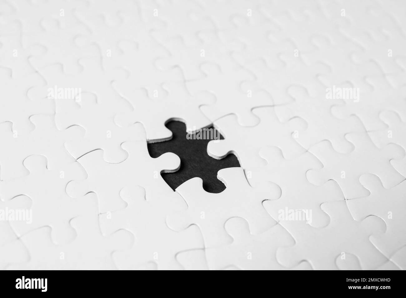 Blank white puzzle with missing piece on black background Stock Photo ...