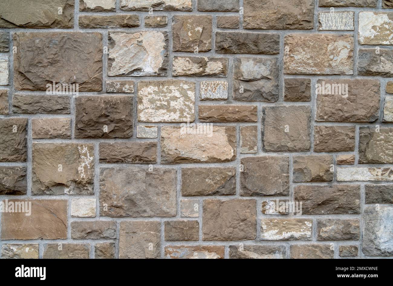 Full frame frontal detail of a stone wall Stock Photo - Alamy