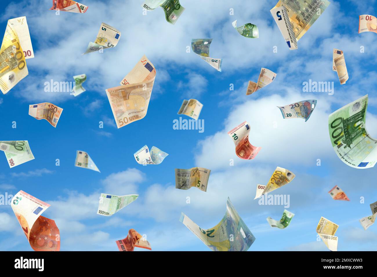 Falling Euro banknotes and blue sky on background. Money rain Stock ...