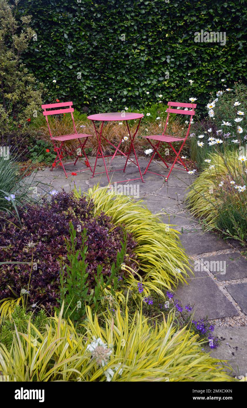 Pink Metal Patio Set in a Quiet Paved Area at RHS Garden Harlow Carr ...