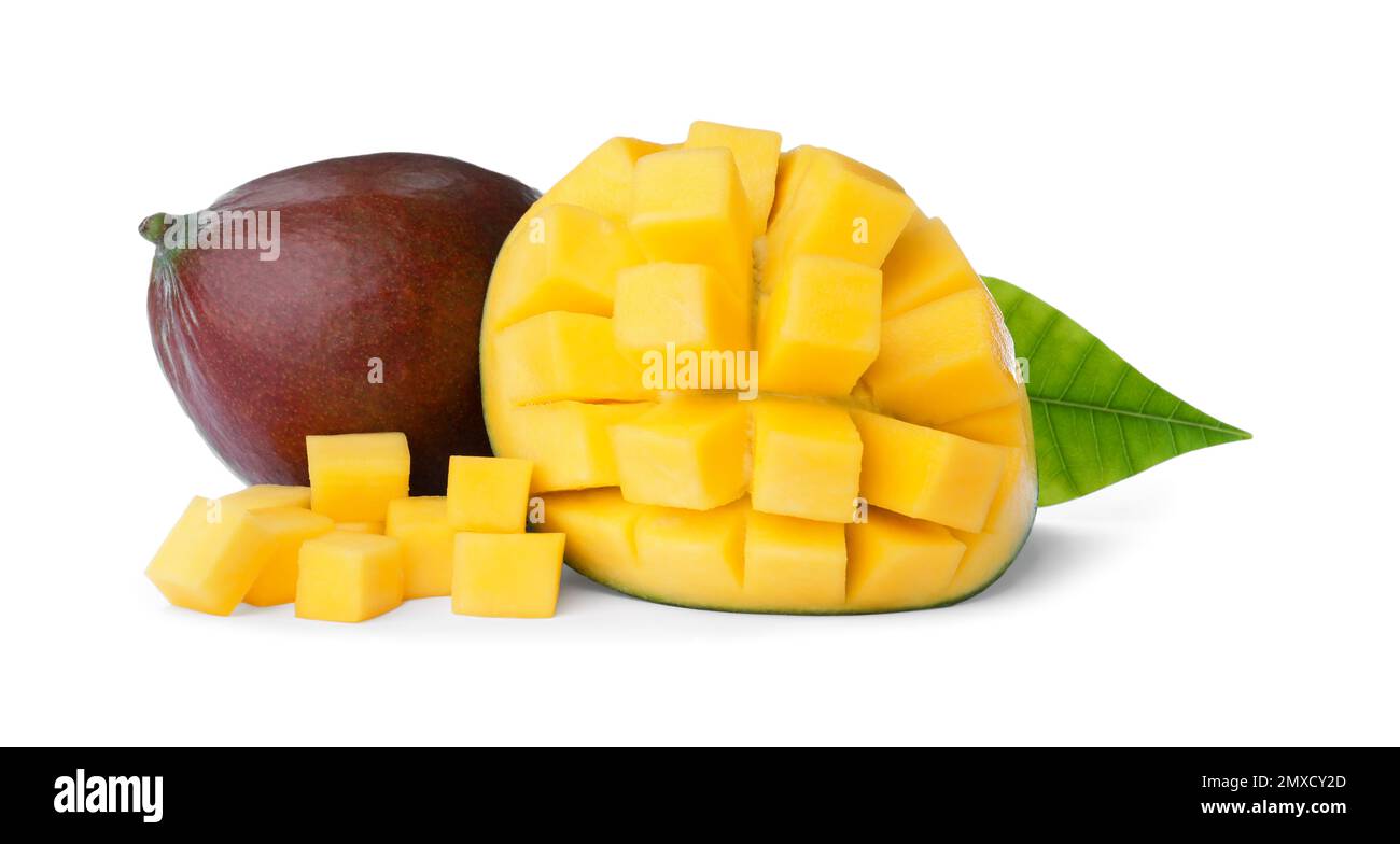 Cut and whole ripe mangoes isolated on white Stock Photo - Alamy