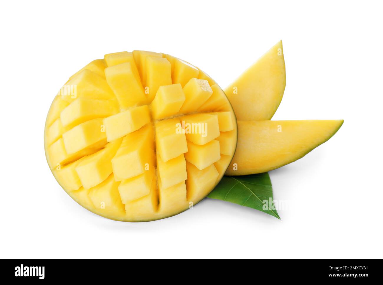 Delicious ripe mango cut into cubes and slices isolated on white Stock ...
