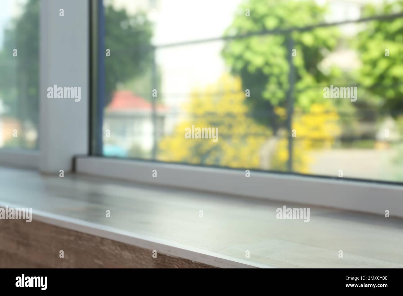 Closeup view of window with wooden sill Stock Photo - Alamy