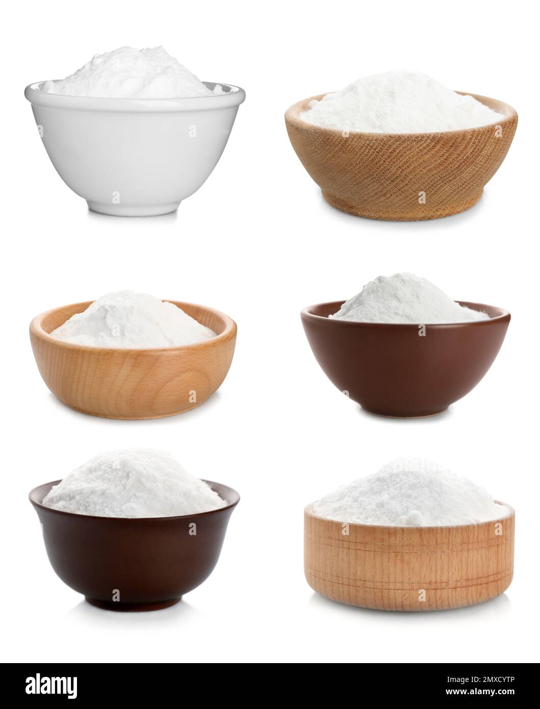 Set with bowls of baking soda on white background Stock Photo - Alamy