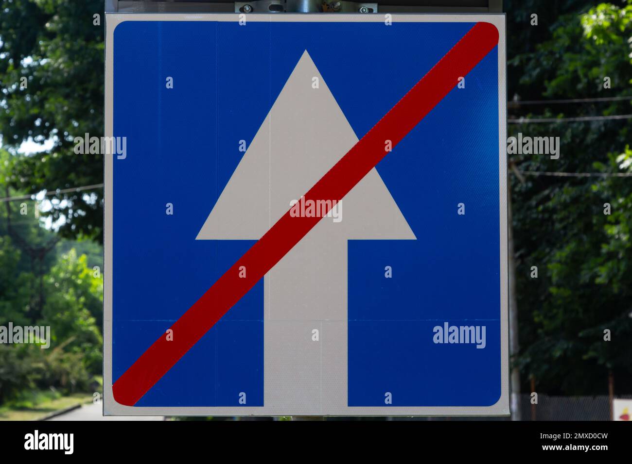 One way street road sign, White arrow in blue background, crossed out ...