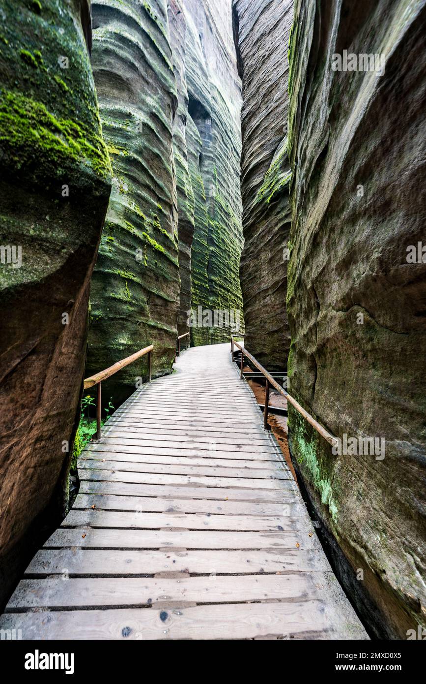 Amazing scenery of wooden trail between rock towers in Adrspasske skaly ...