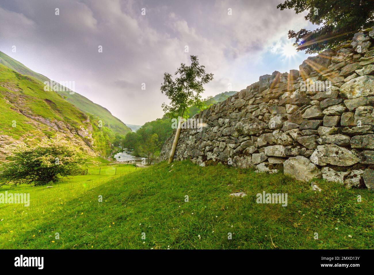 A beautiful view of the Peak District National Park with green meadows ...