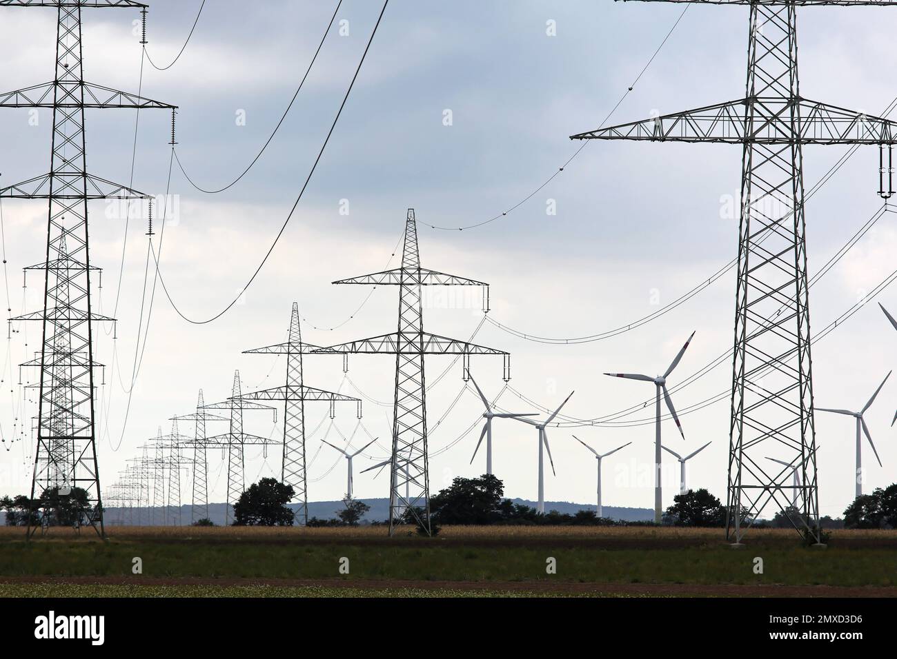 wind turbines and power poles, Austria Stock Photo - Alamy