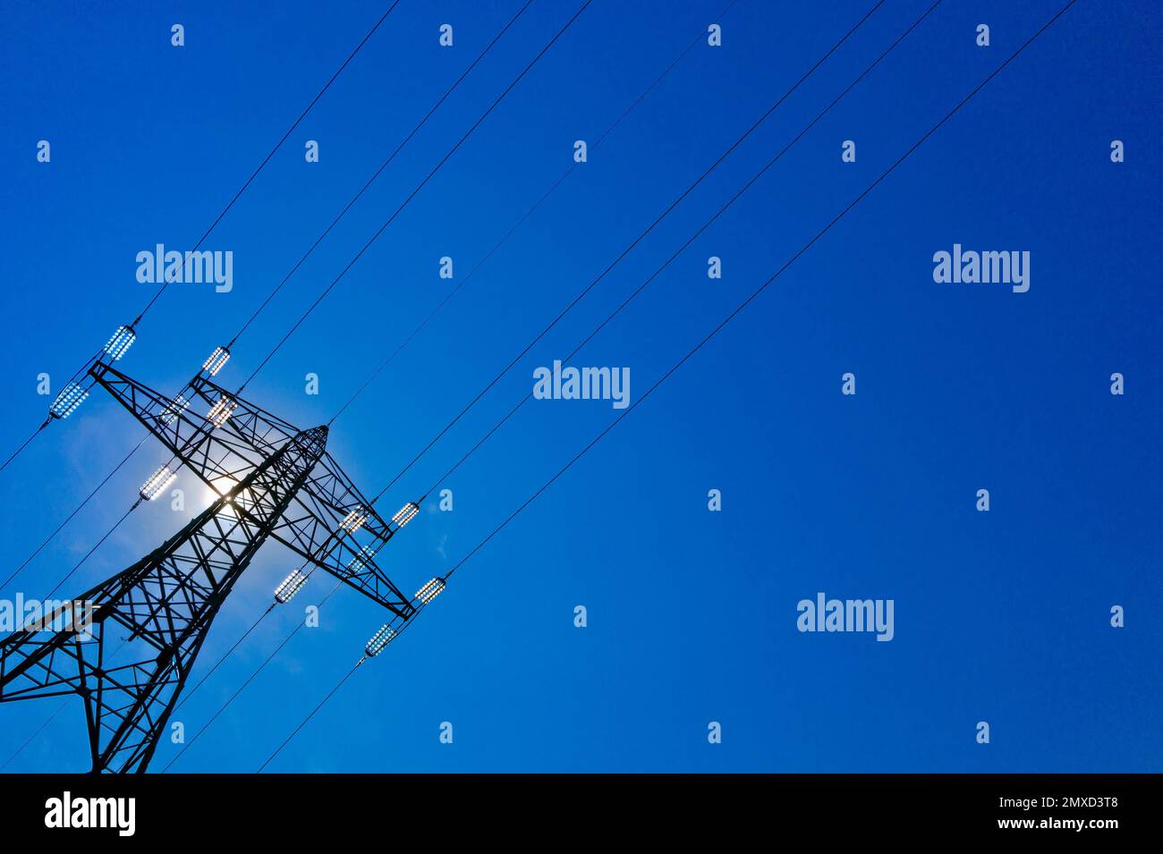 high voltage pylon in the sun, detail, Austria Stock Photo - Alamy