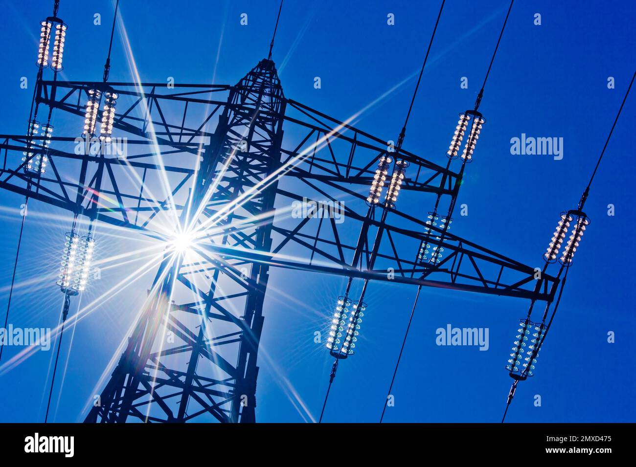 high voltage pylon in the sun, detail, Austria Stock Photo - Alamy