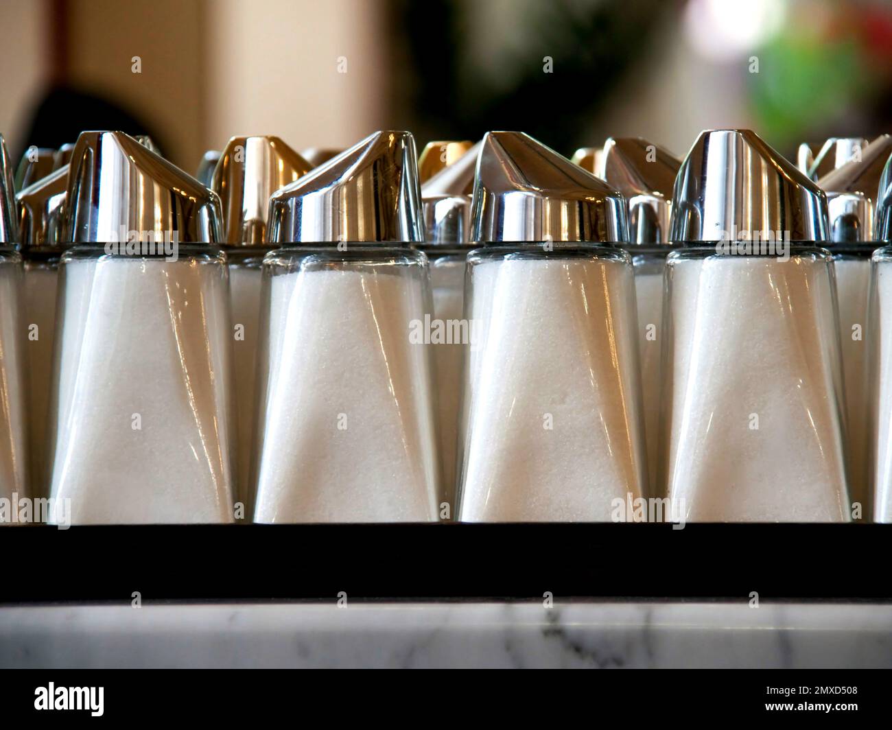 many sugar shakers in a cafe Stock Photo - Alamy