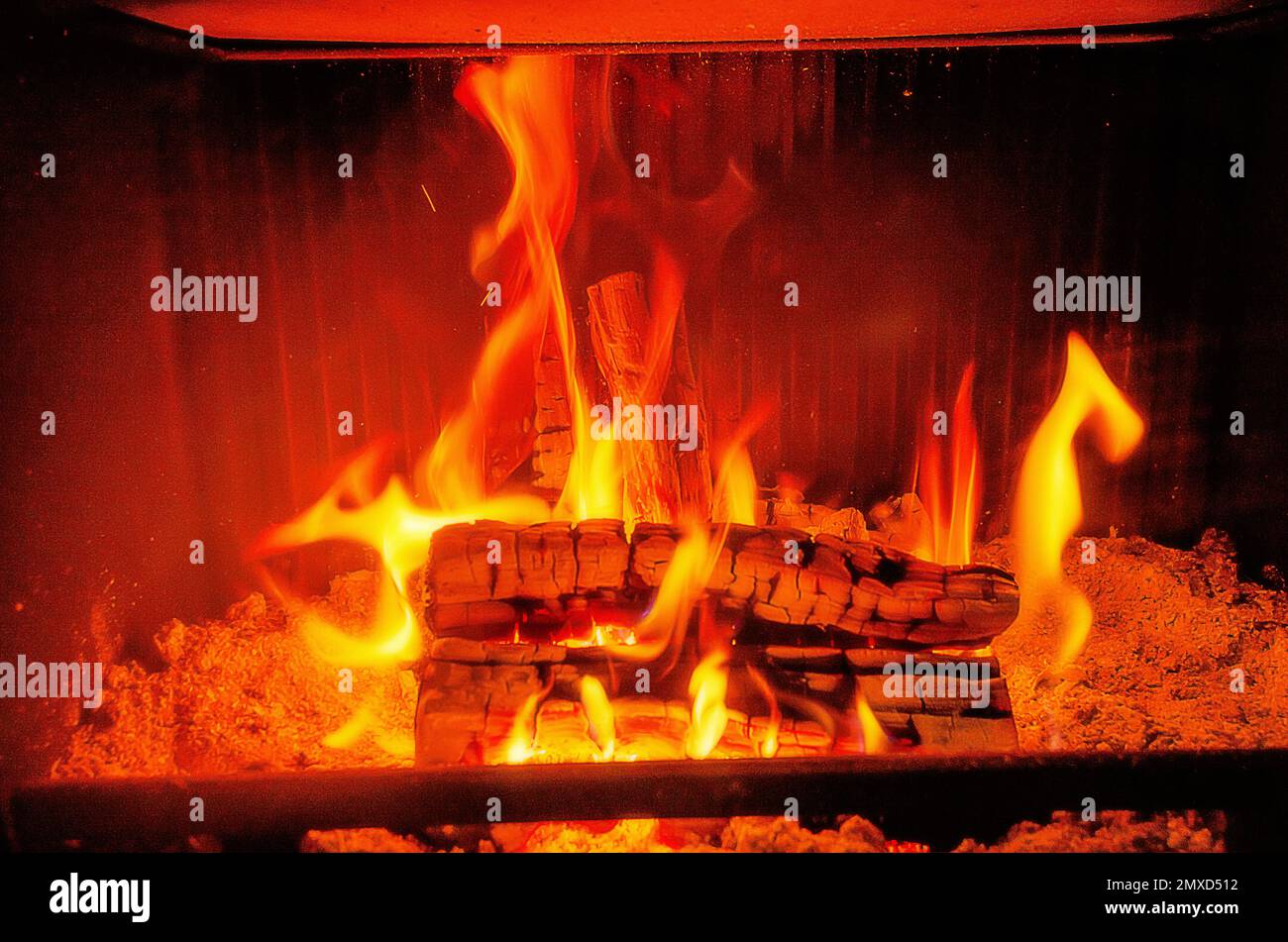 Fire in the fireplace. Firewood is burned in a home oven Stock Photo ...
