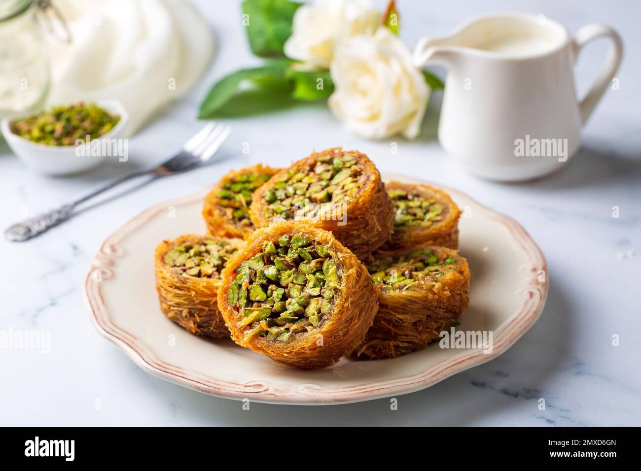 Traditional Turkish desserts; Kadaif stuffed with pistachios. Turkish ...