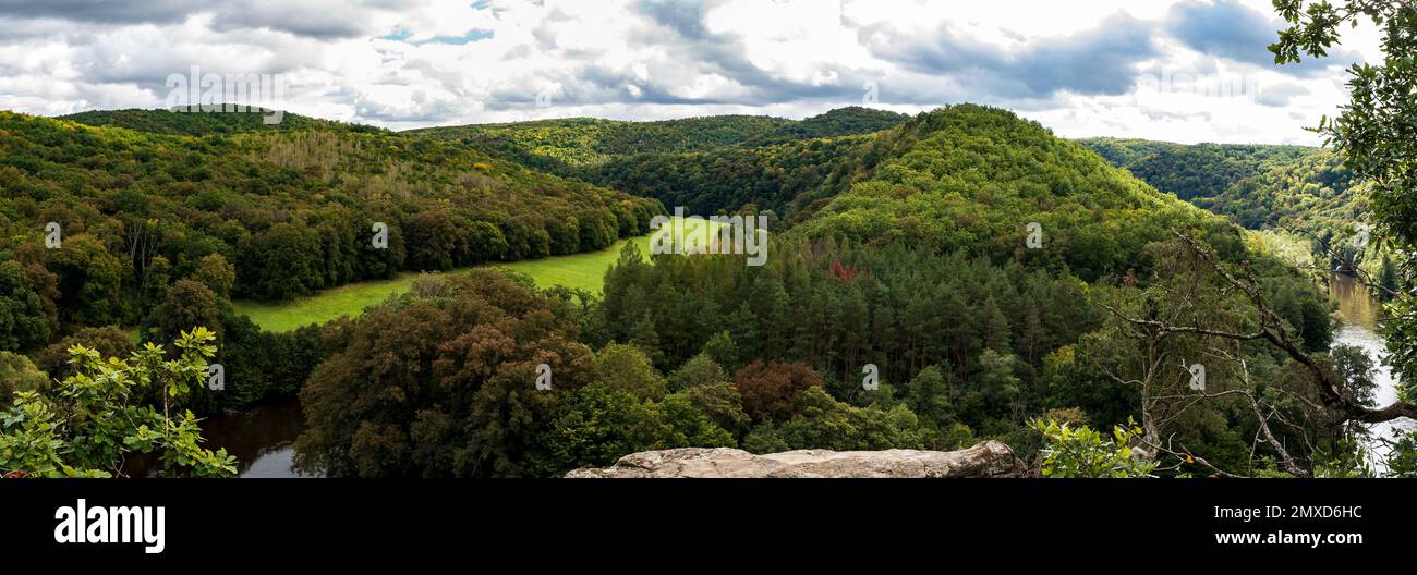 Thaya river meander with small meadow and forest covered hills above ...