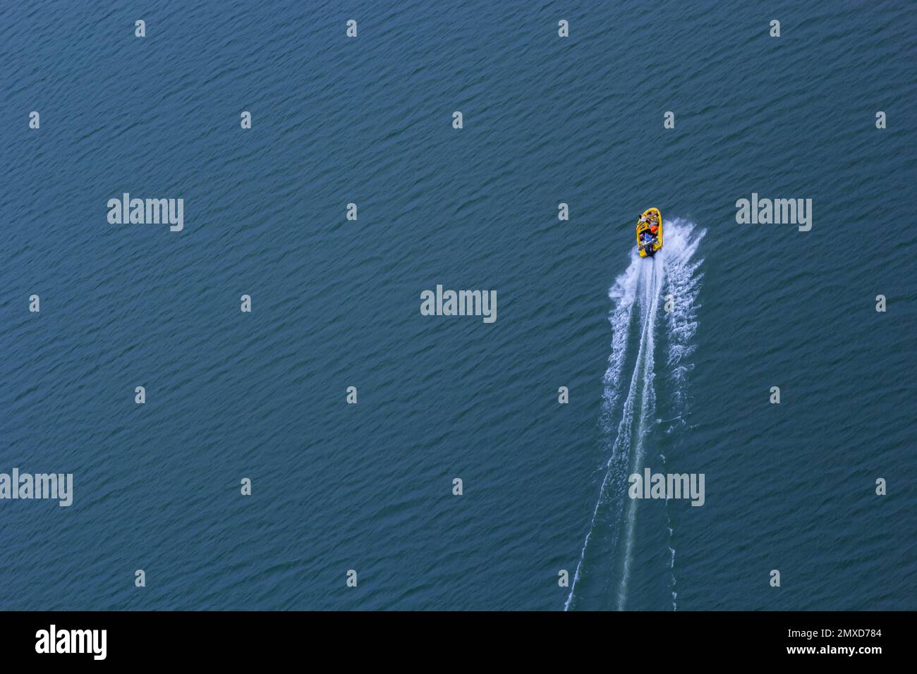 A top-down view of the speed of a motorboat sailing on water Stock ...