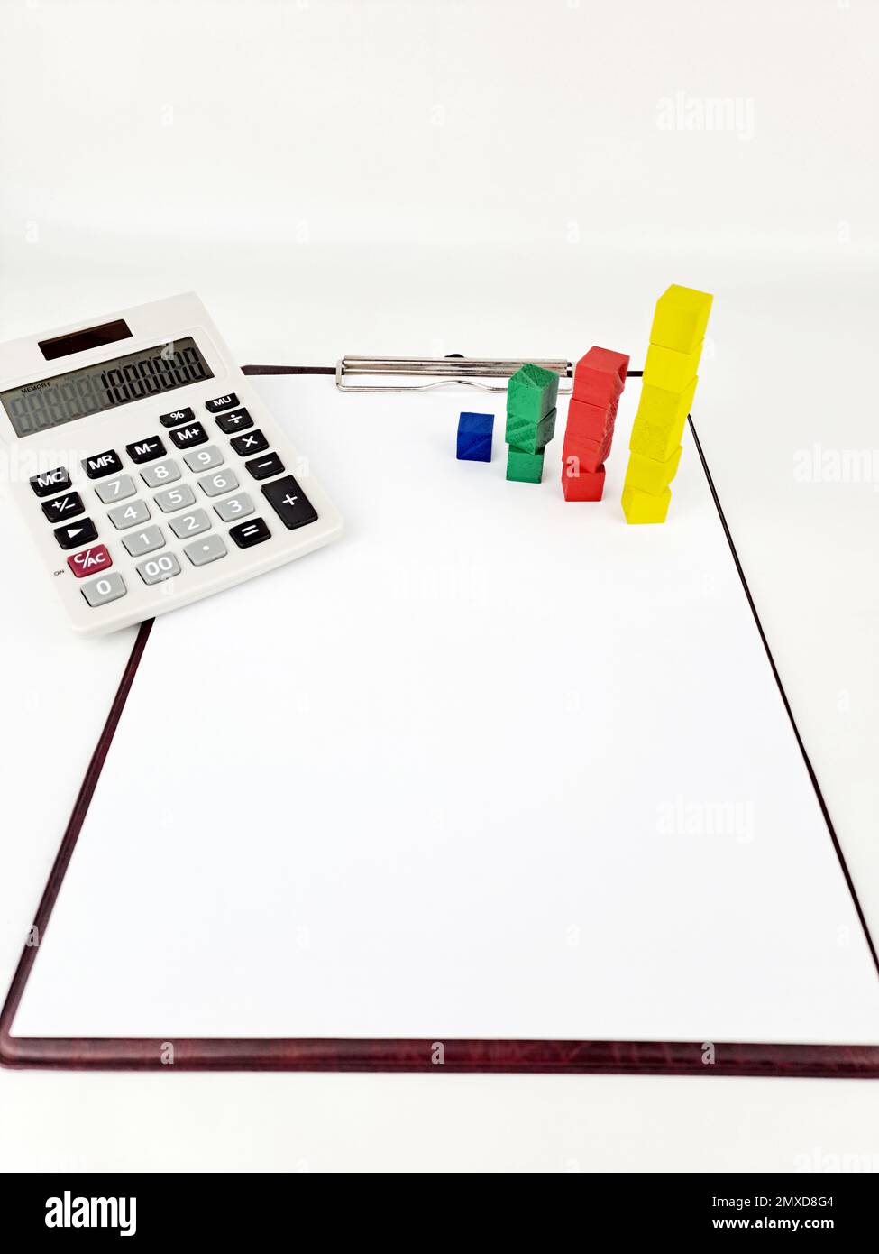 Abstract graph with colored cubes with clipboard and calculator, with ... Abstract graph with colored cubes with clipboard and calculator, with ...
