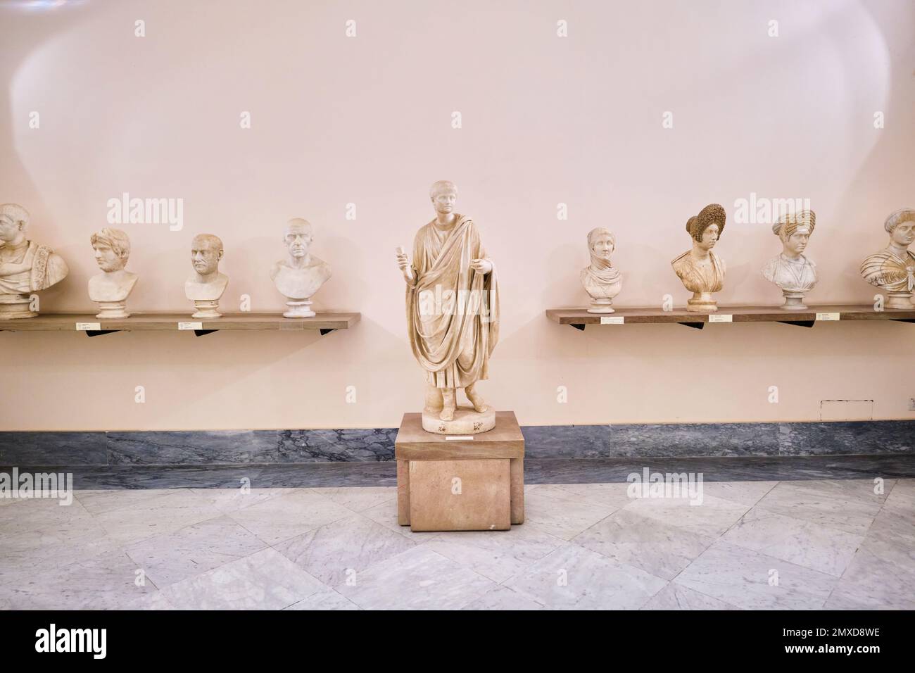 A collection of carved, white marble heads, busts of prominent men and ...