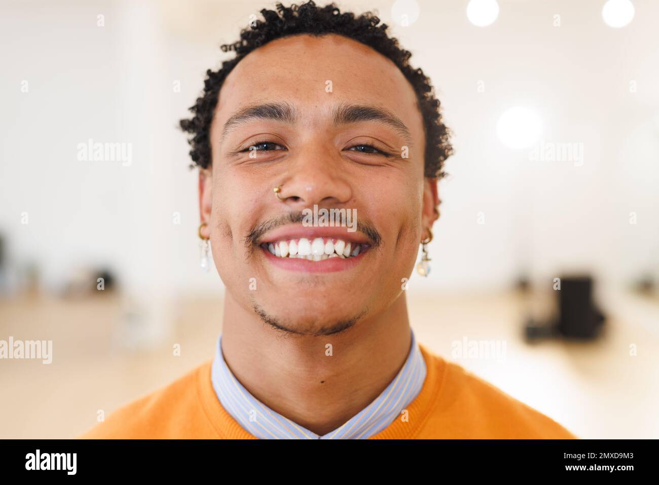 Image of happy biracial male hip hop dancer posing to camera. Dance ...
