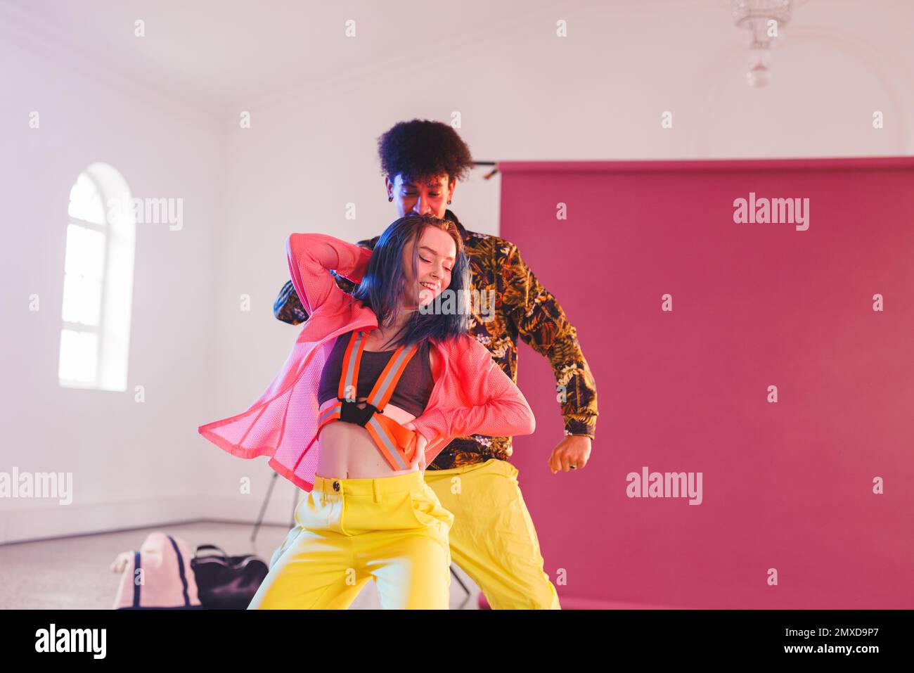Image of happy diverse female and male hip hop dancers in studio. Dance ...