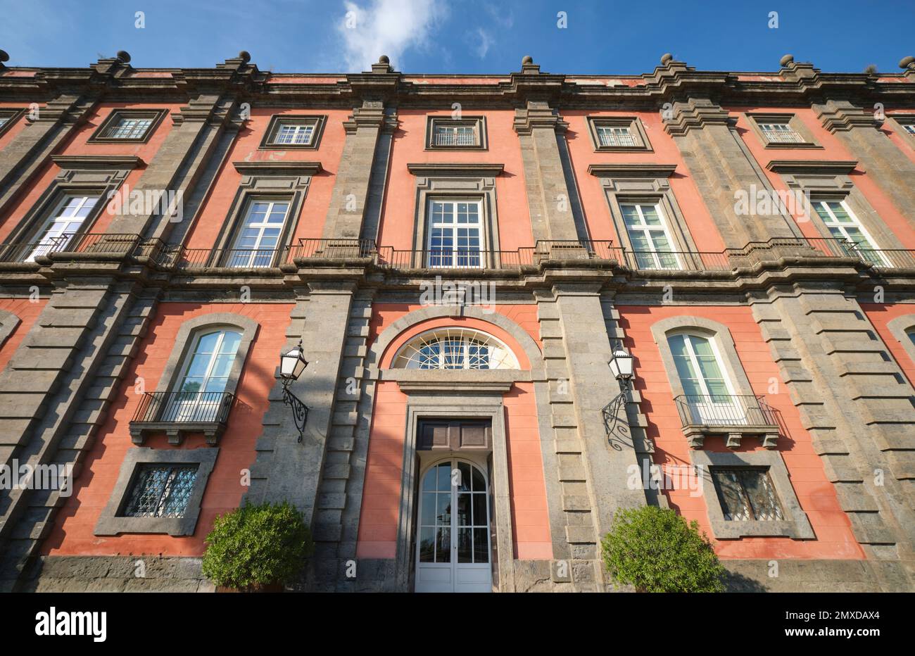 The exterior facade of the red museum. At the art museum, Museo e Real ...