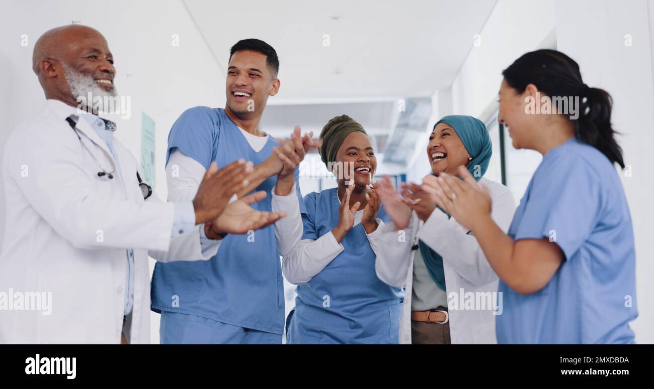 Applause, healthcare teamwork and hospital success, collaboration or motivation. Diversity ...