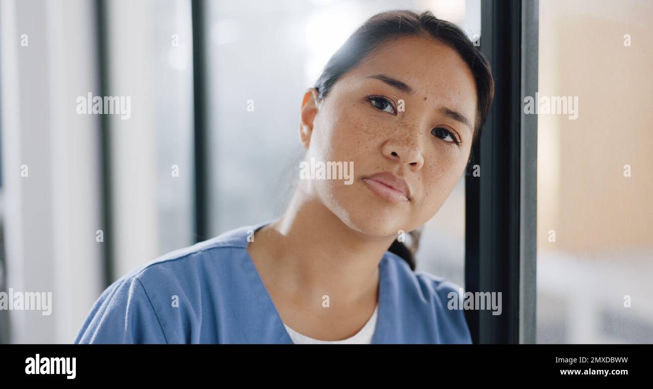 Woman, depression and sad nurse in hospital after loss, failure or bad ...