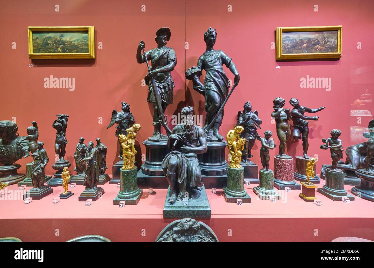 A collection of black marble small statues, including a copy of Moses ...