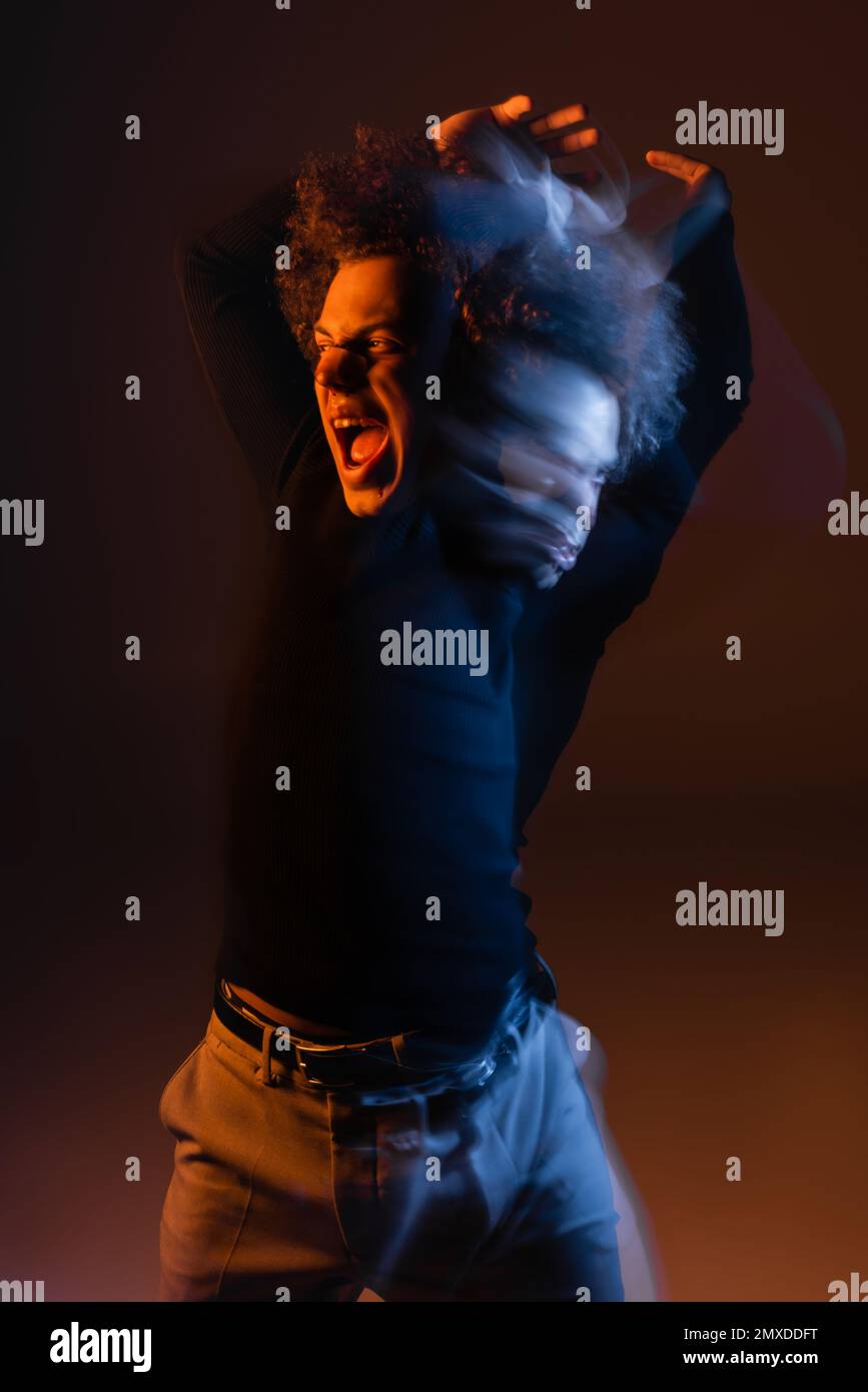 double exposure of injured and angry african american man with bipolar ...