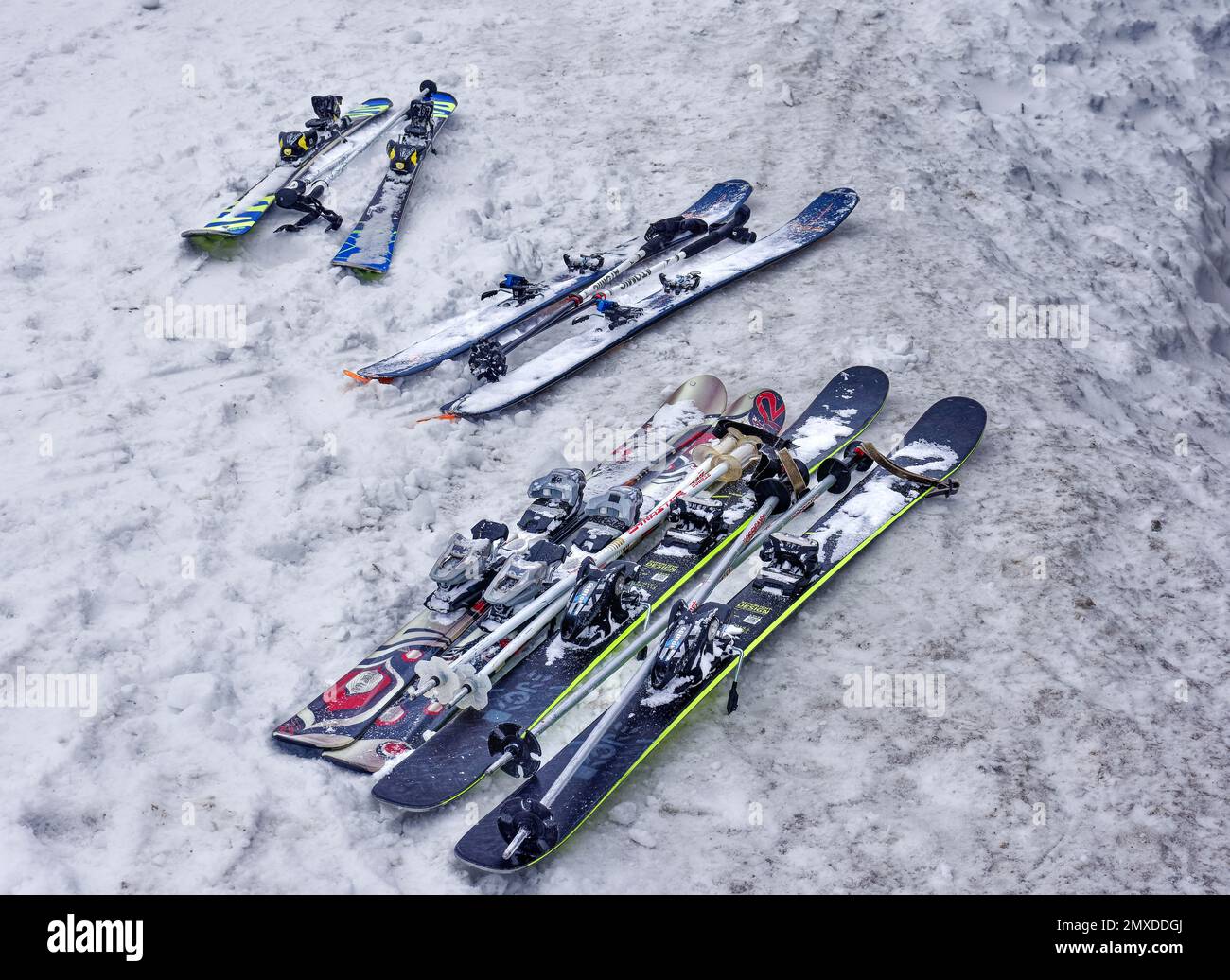 Cairngorm Mountain Aviemore Top Station Skis pairs lying in the hard ...