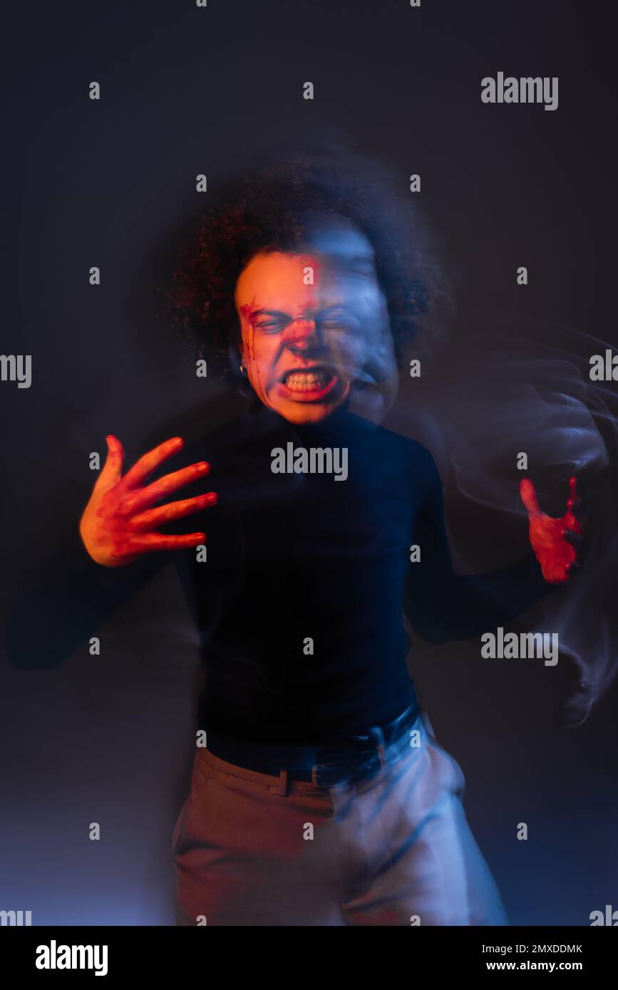 double exposure of angry african american man with injured face and ...