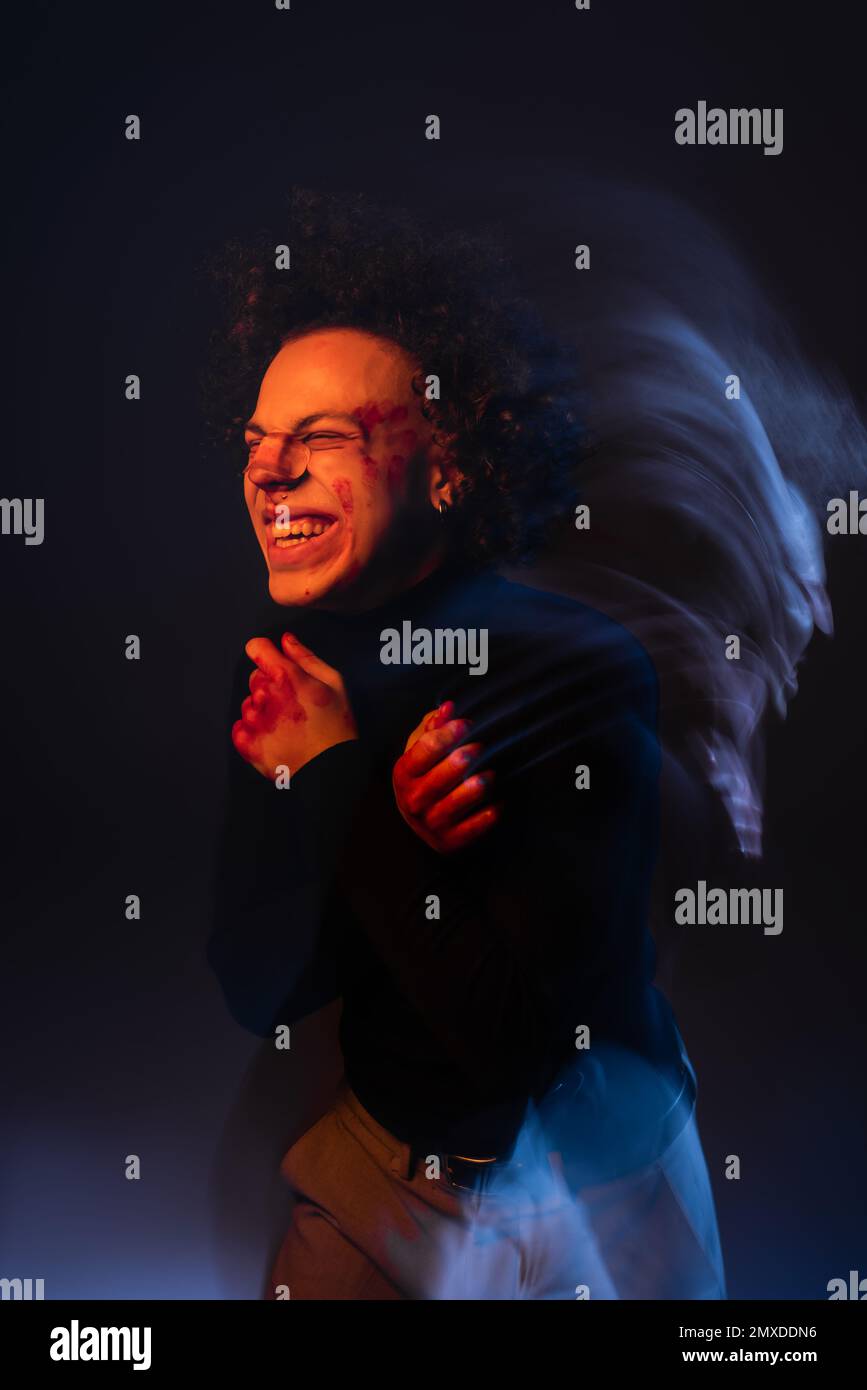 motion blur of wounded african american man with bipolar disorder and ...