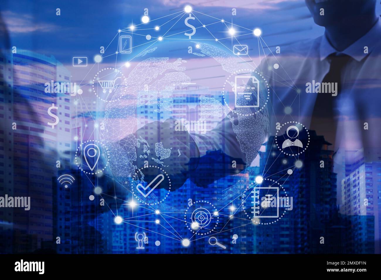 Multiple exposure of scheme, cityscape and businesspeople shaking hands ...