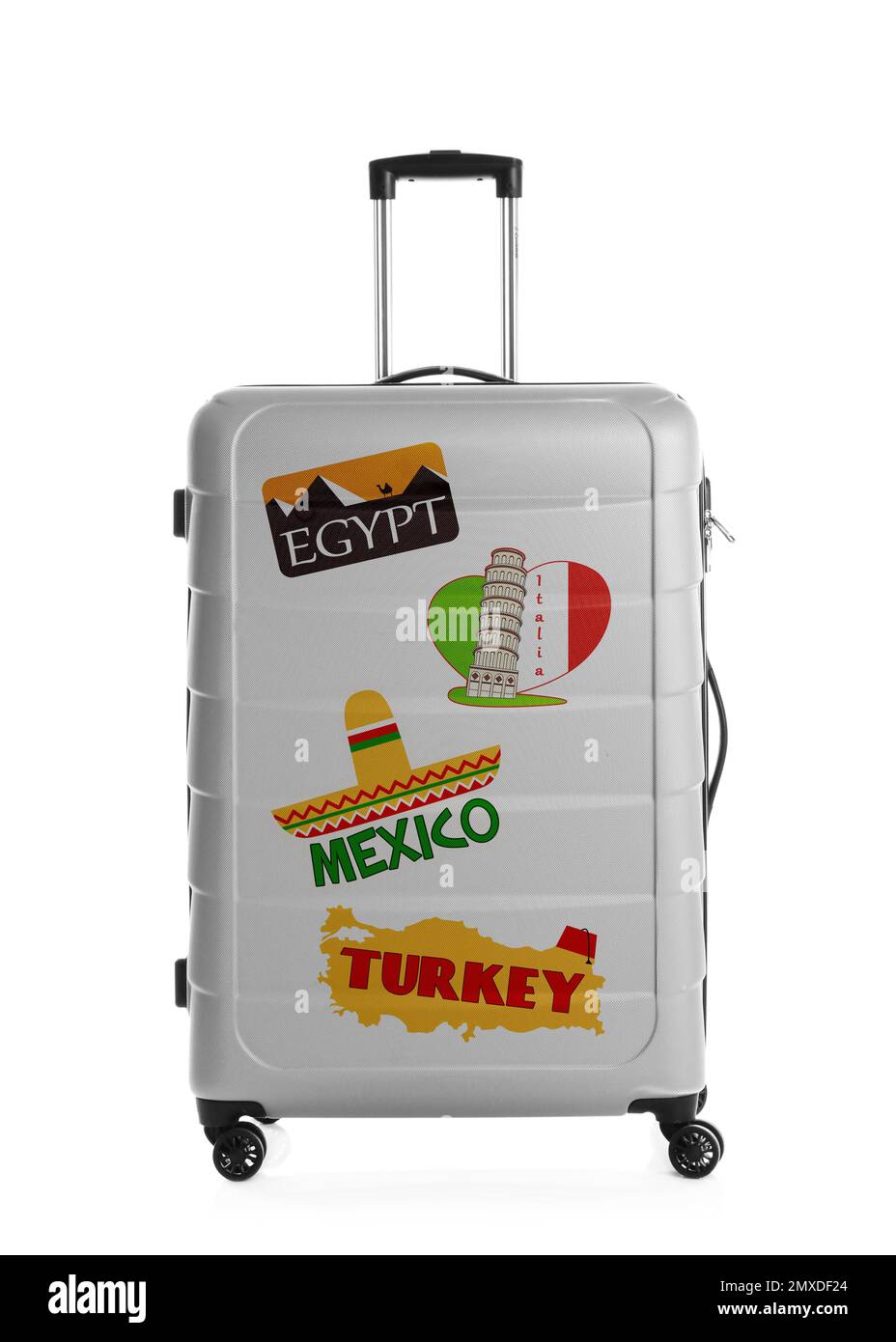Modern suitcase with travel stickers on white background Stock Photo ...