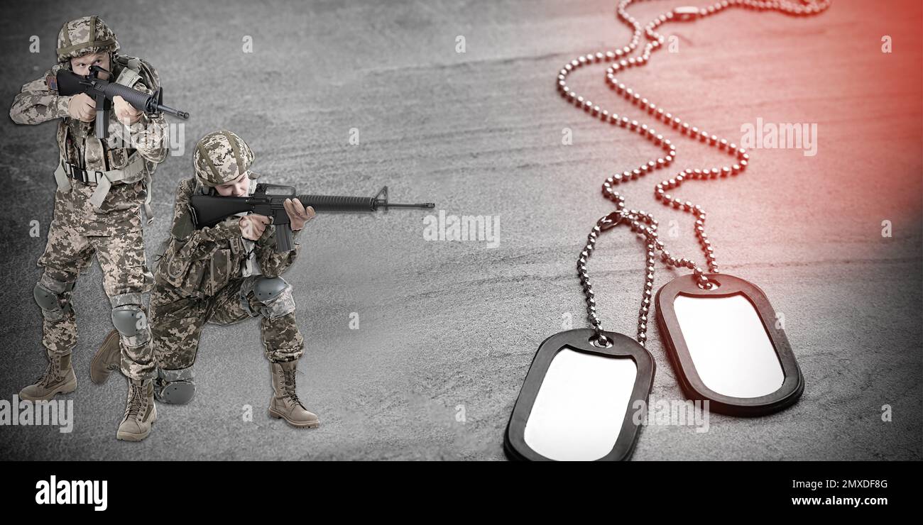 Soldiers with machine guns and military ID tags on color background ...