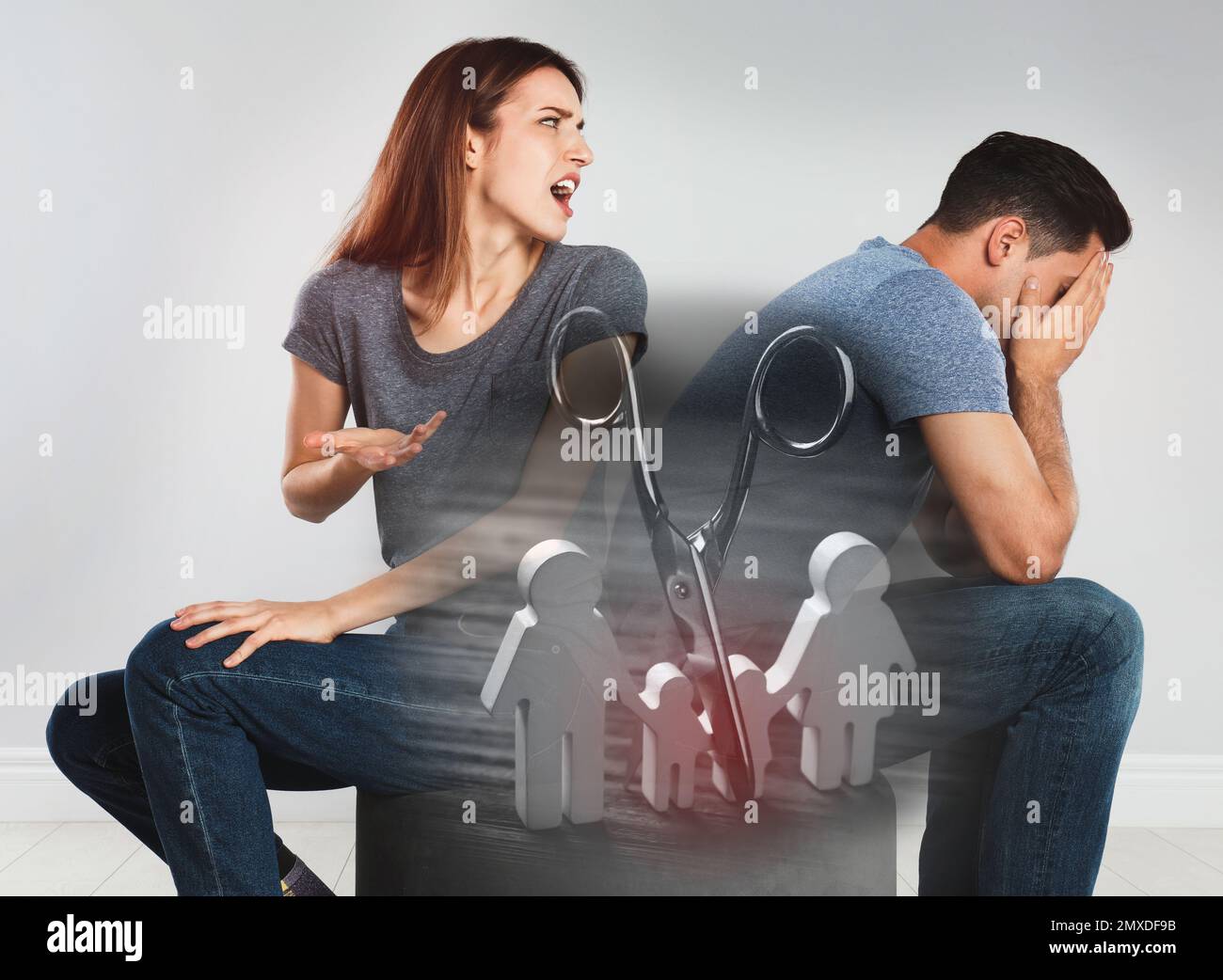 Double exposure of family figure with scissors and couple quarreling on ...