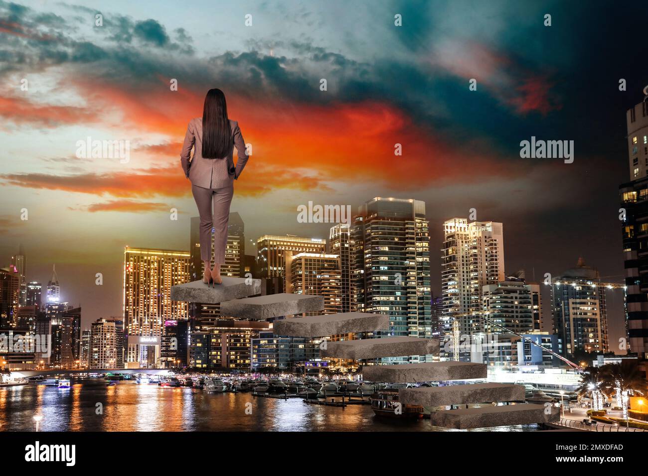 Woman standing on step ladder hi-res stock photography and images - Alamy