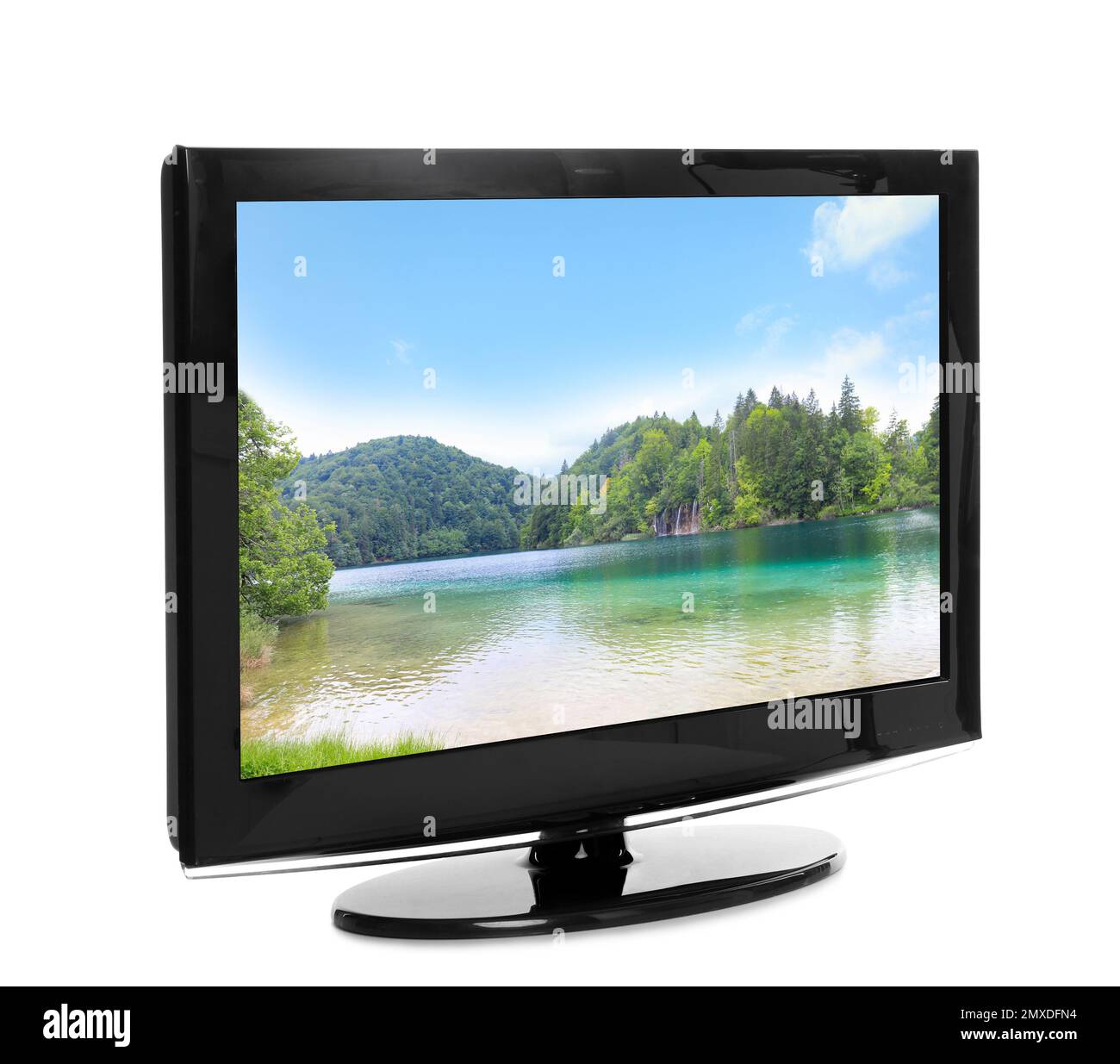 Modern plasma TV with landscape on screen against white background ...