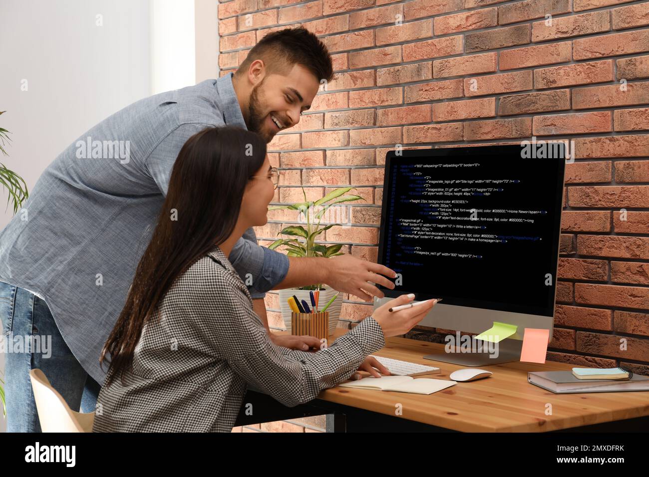 Team programmers in office hi-res stock photography and images - Alamy