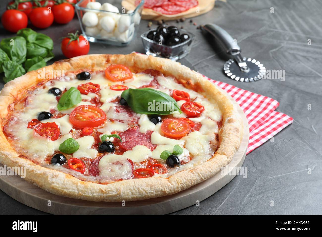 Delicious pizza Diablo on grey table, closeup Stock Photo - Alamy