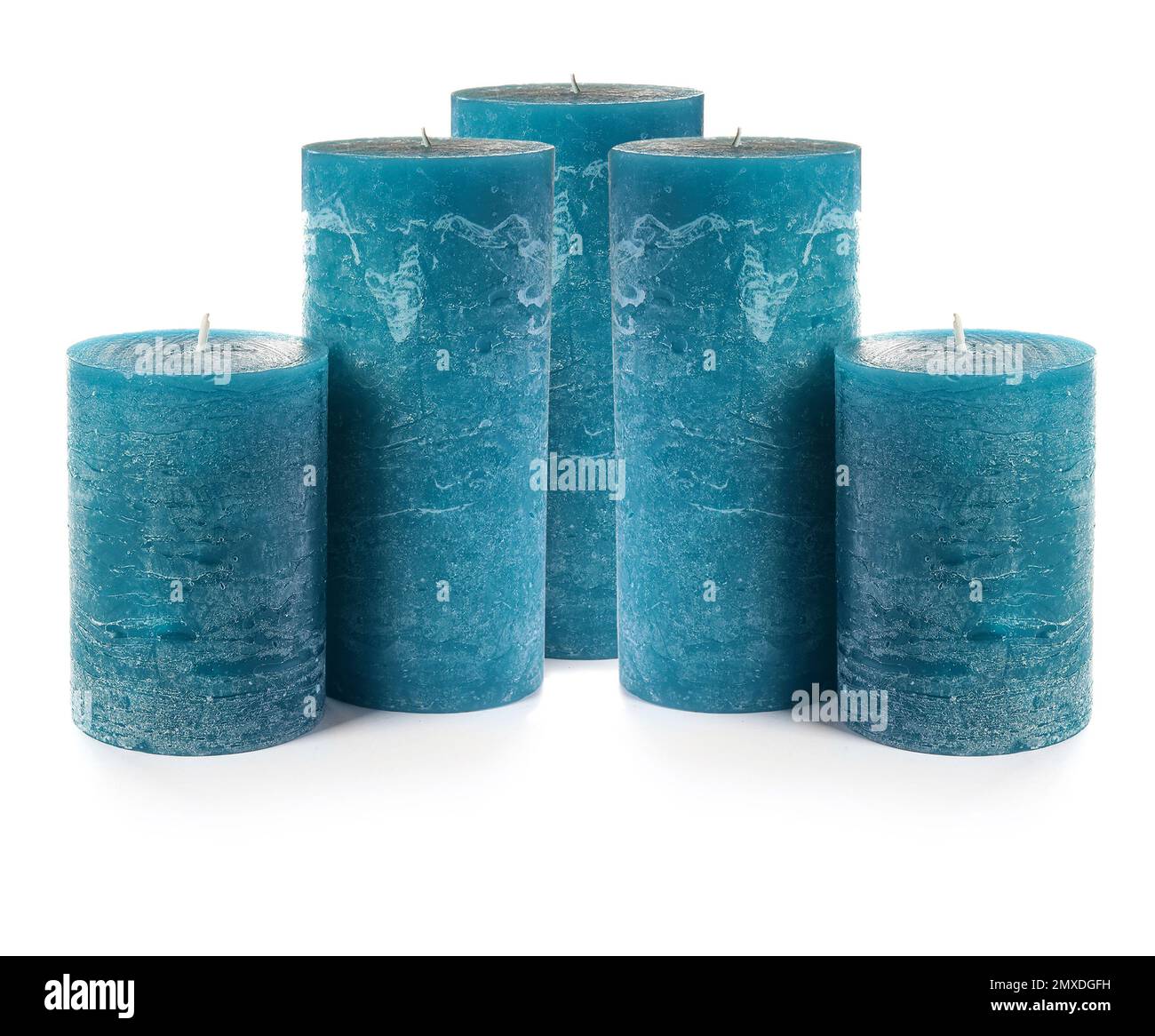 Set of blue wax candles on white background Stock Photo - Alamy
