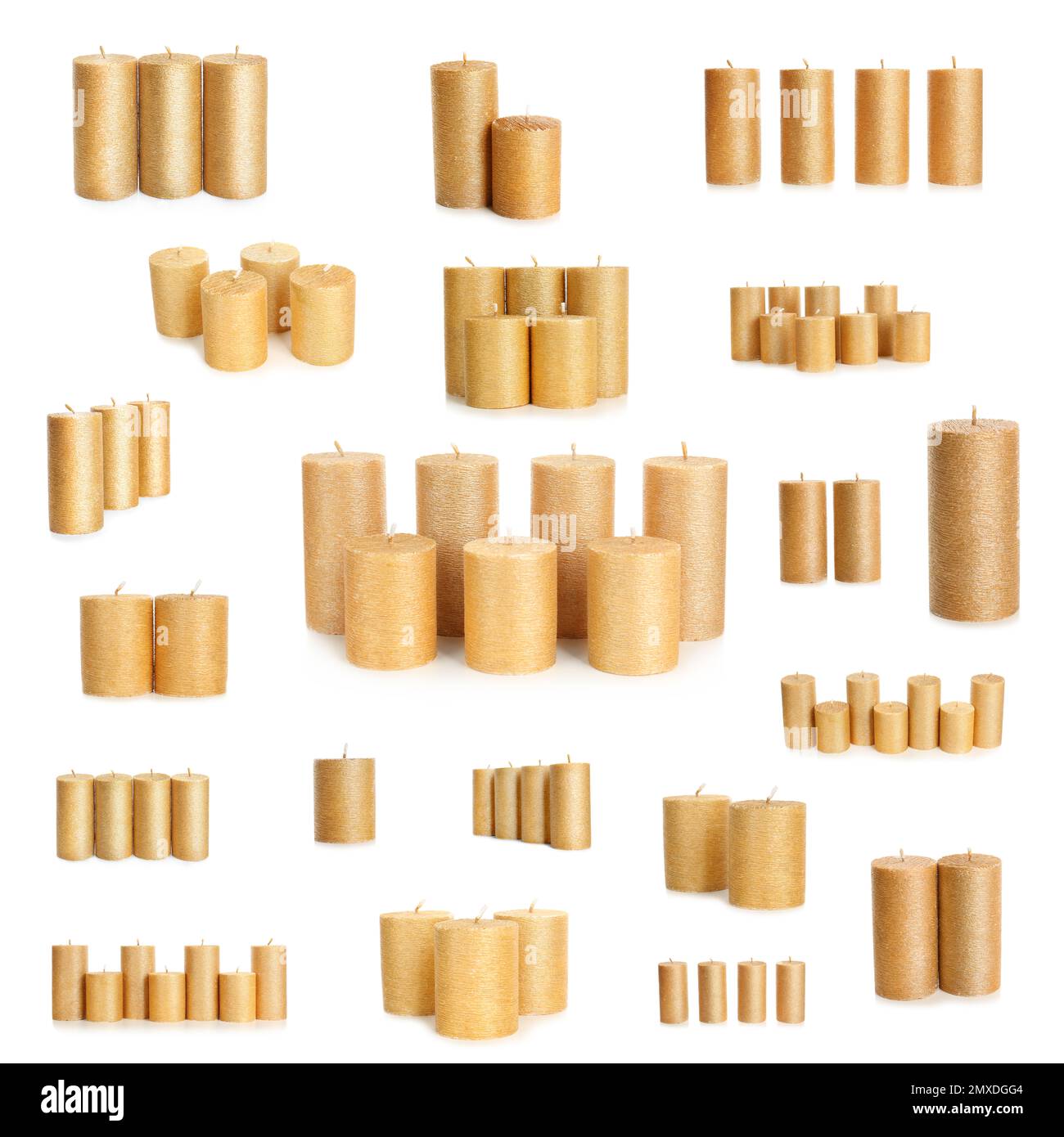 Set of elegant gold candles on white background Stock Photo - Alamy
