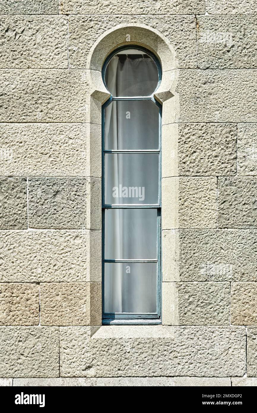 Old medieval window surrounded by stone wall in castle attracts ...