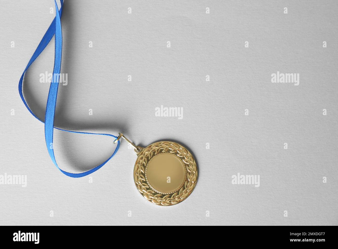 Gold medal on white background, top view. Space for design Stock Photo ...