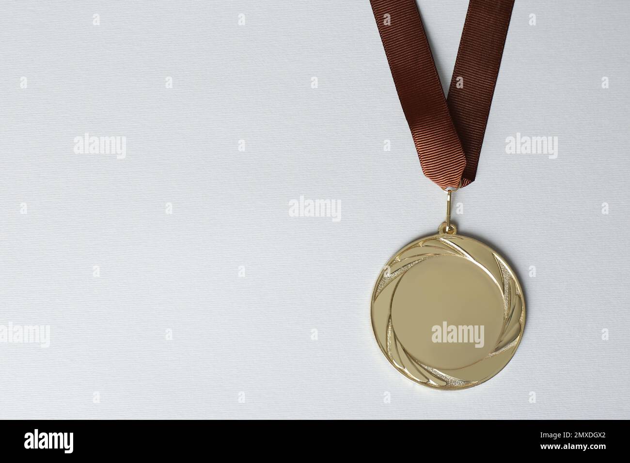 Gold medal on white background, top view. Space for design Stock Photo ...