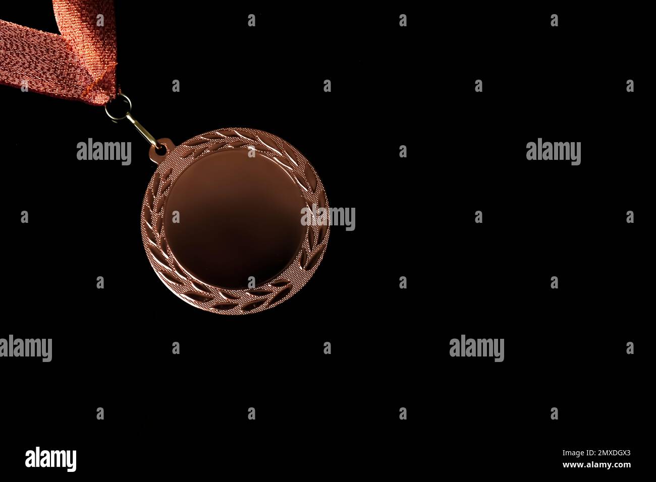 Bronze medal on black background, top view. Space for design Stock ...